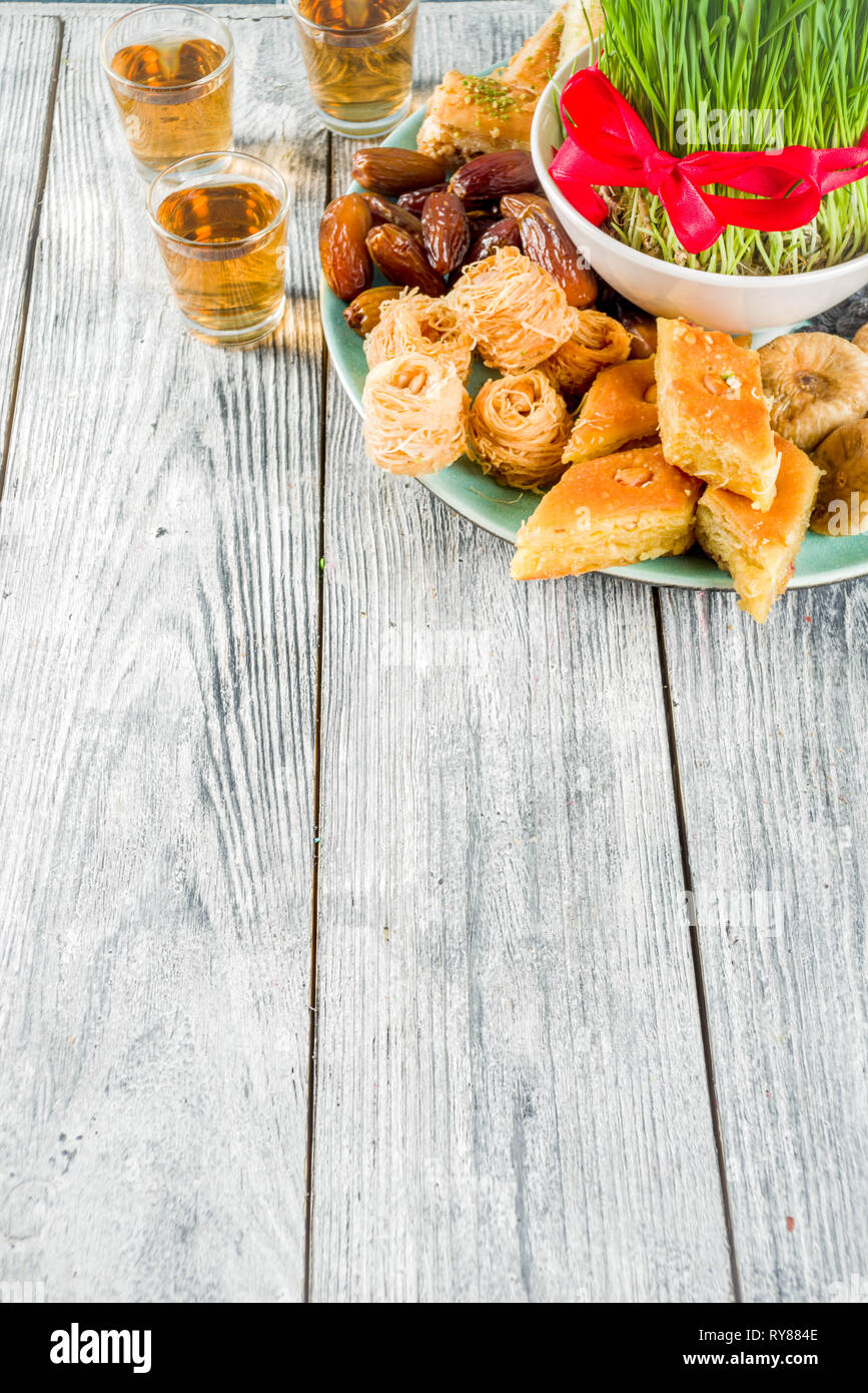 Happy Nowruz holiday background. Celebrating Nowruz sweets and treats ...