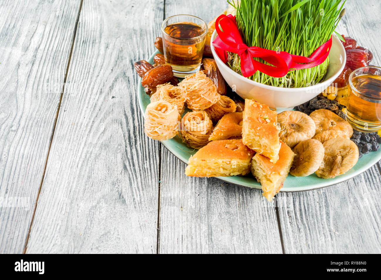 Happy Nowruz holiday background. Celebrating Nowruz sweets and treats ...