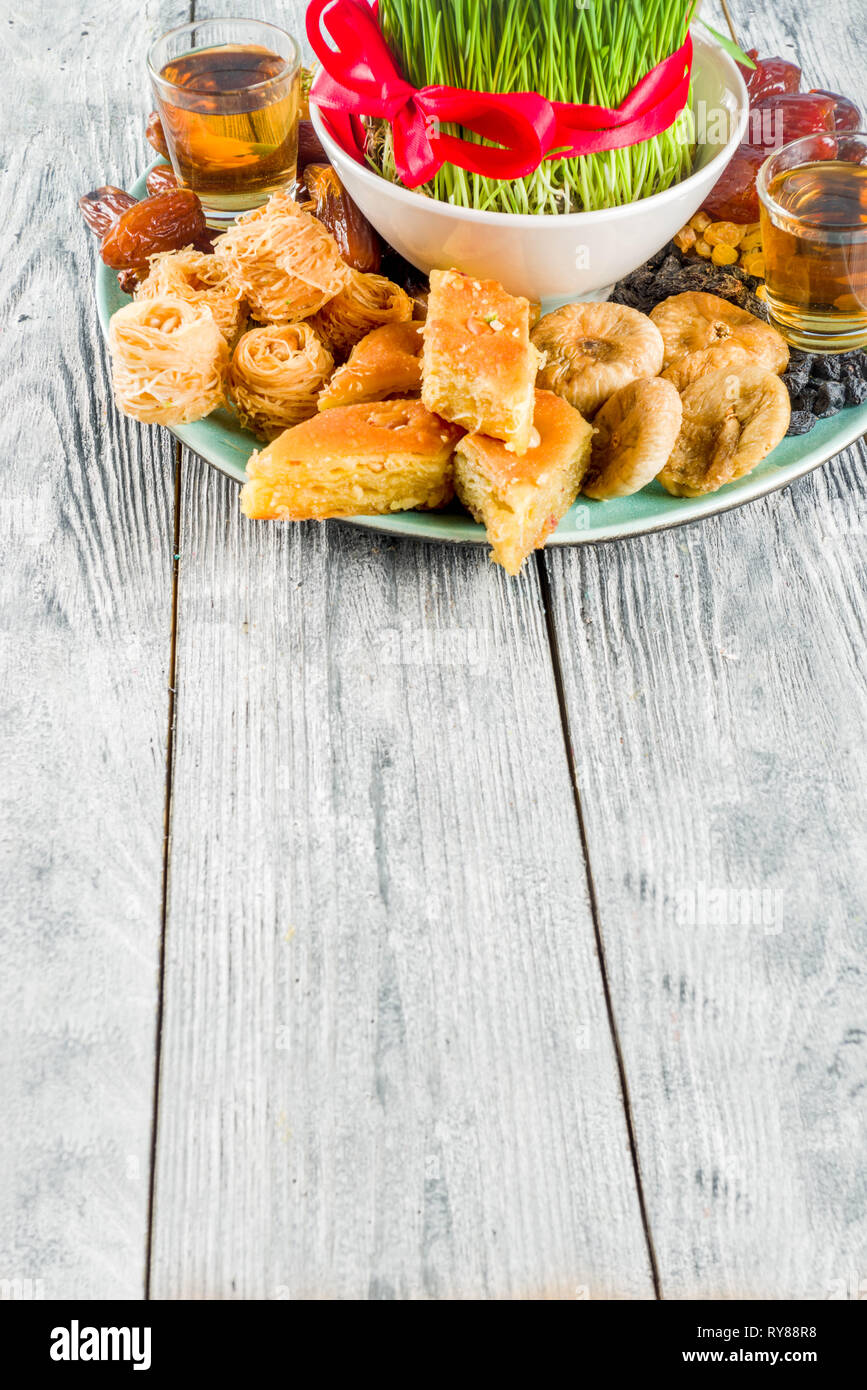 Happy Nowruz holiday background. Celebrating Nowruz sweets and treats ...