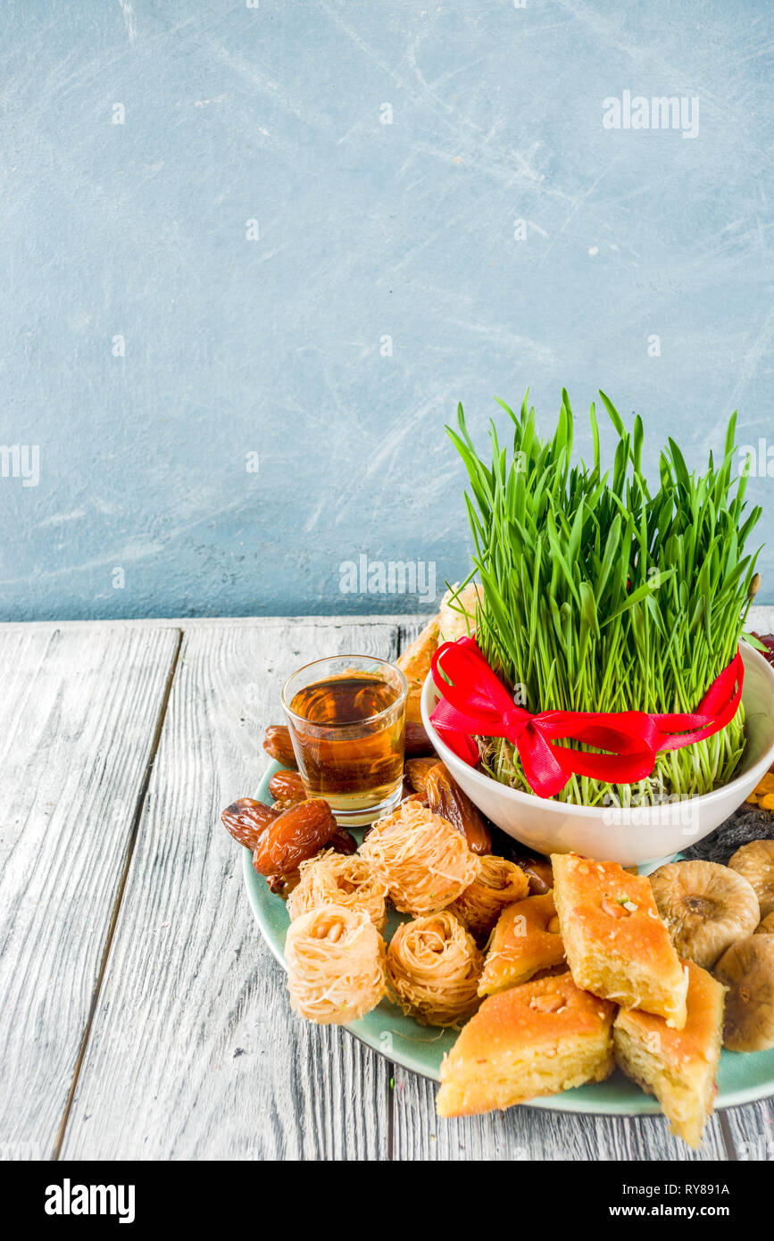 Happy Nowruz holiday background. Celebrating Nowruz sweets and treats ...