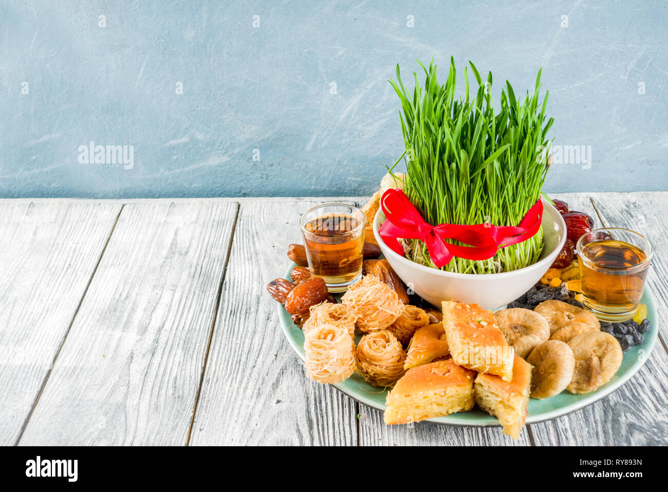 Happy Nowruz holiday background. Celebrating Nowruz sweets and treats ...