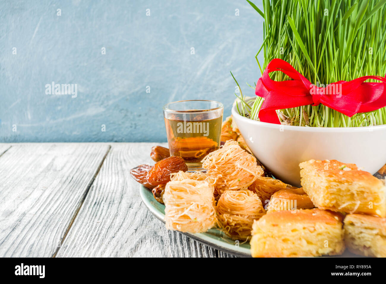 Happy Nowruz holiday background. Celebrating Nowruz sweets and treats ...