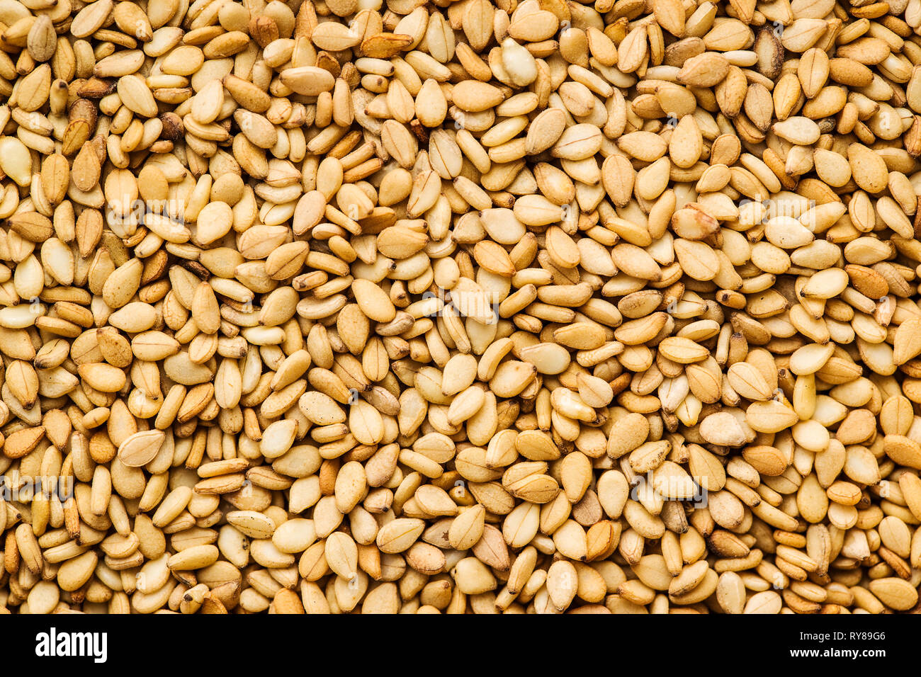 Roasted sesame seeds. Pattern of sesame Stock Photo - Alamy
