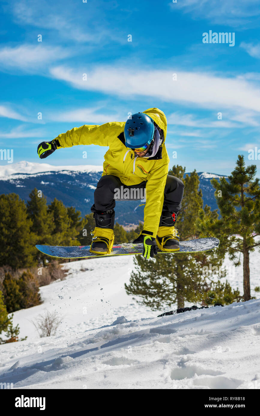 Young man jumping against blue sky hi-res stock photography and images ...