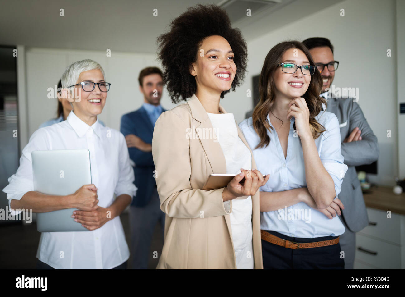 Successful business group of people at work in office Stock Photo - Alamy