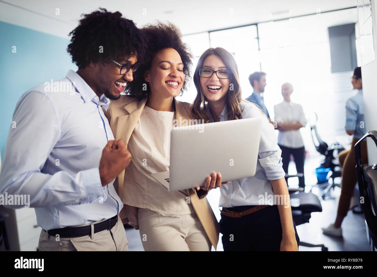 Programmers cooperating at IT company developing apps Stock Photo - Alamy