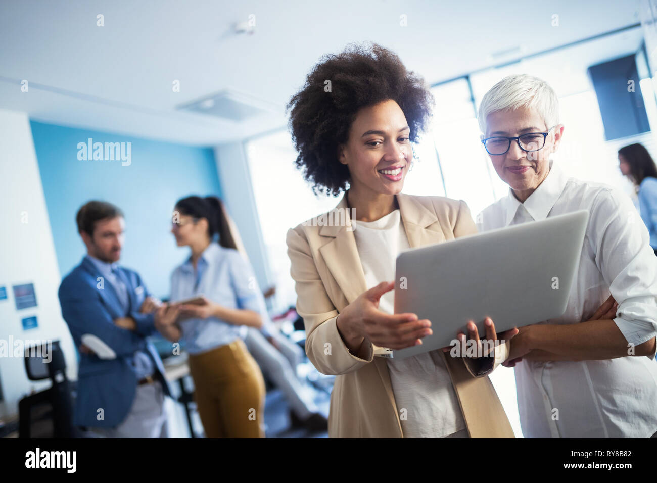 Successful business group of people at work in office Stock Photo - Alamy