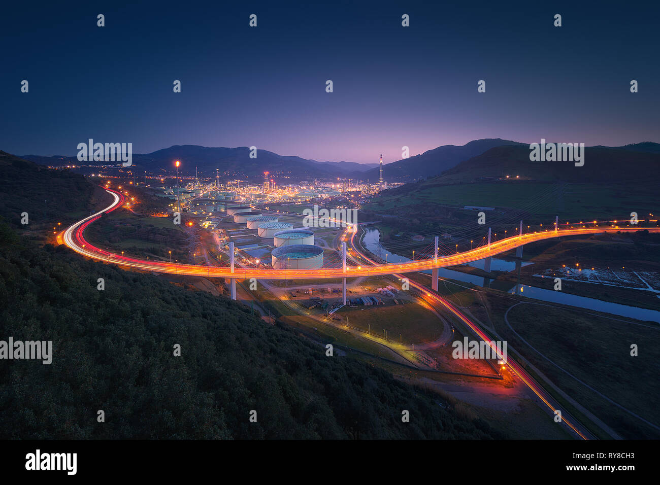 La Arena bridge with car trails in Muskiz at night Stock Photo - Alamy