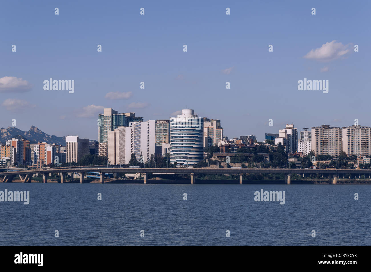 cityscape of Seoul with river Han, blue sky and mountain view Stock ...