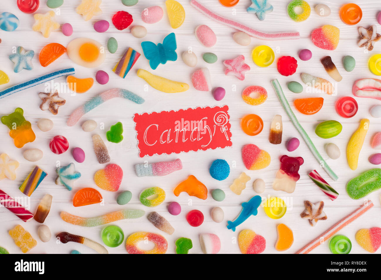 Composition from multicolored candies Stock Photo - Alamy