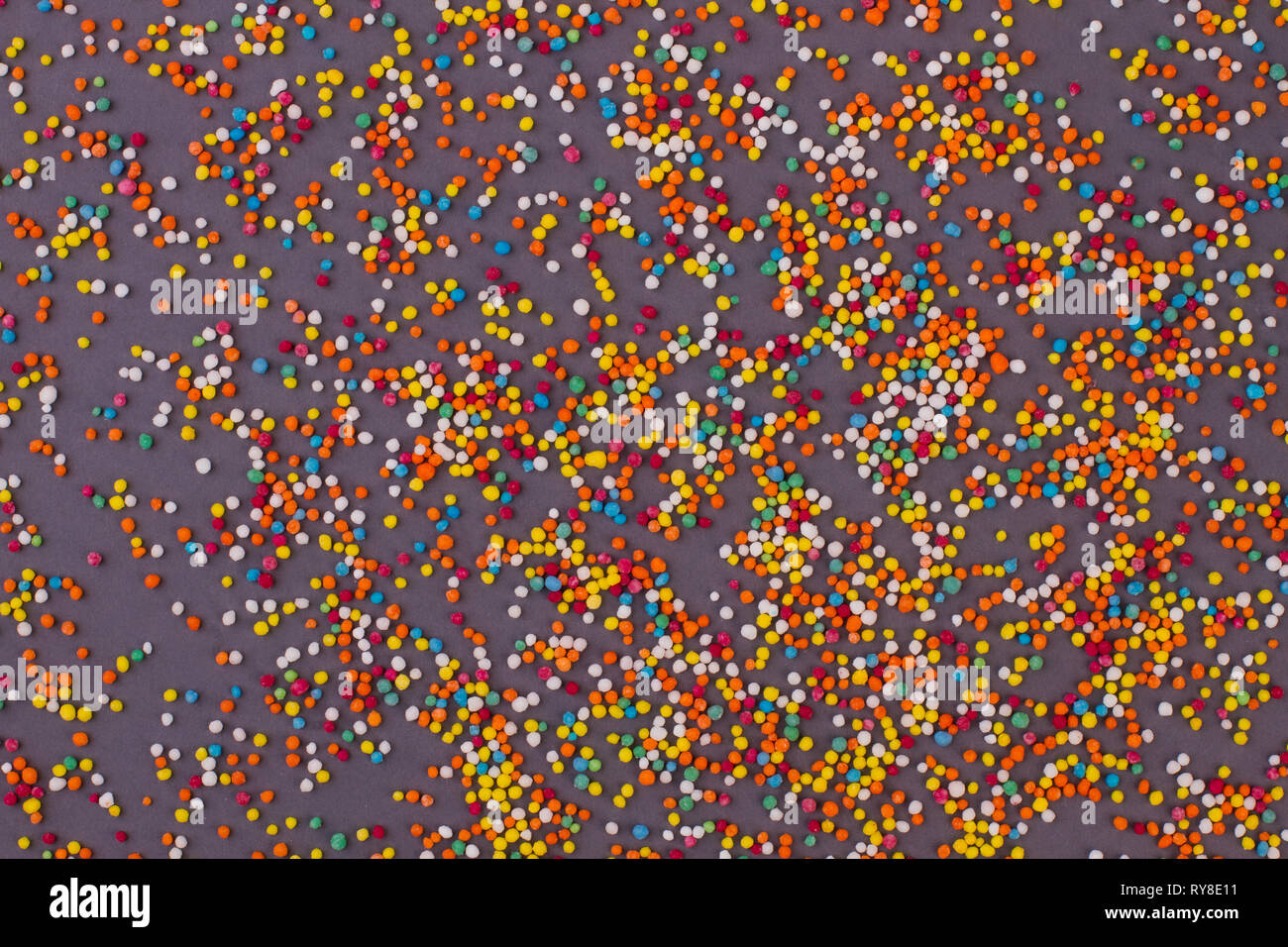 Rainbow sprinkles on black hi-res stock photography and images - Alamy