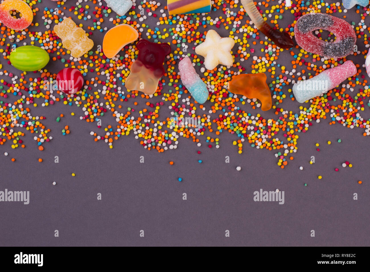 Creative arrangement of colorful candies and sweets Stock Photo - Alamy