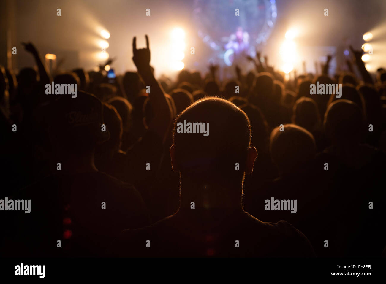 The audience with their hands on a rock concert Stock Photo - Alamy
