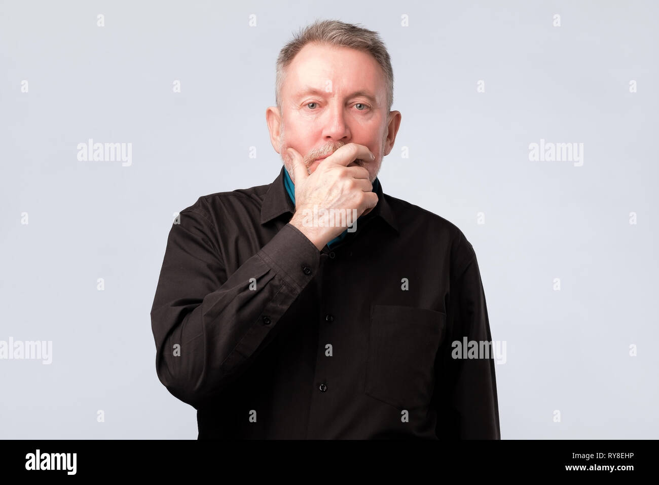 Old man thinking studio hi-res stock photography and images - Alamy