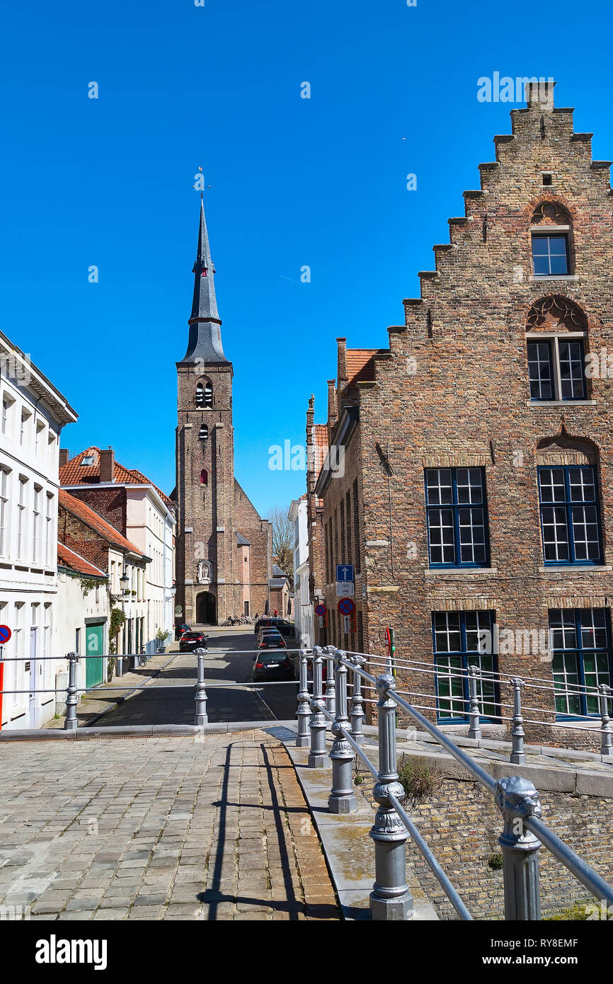 Panorama with cathedral tower and traditional houses in popular belgian ...