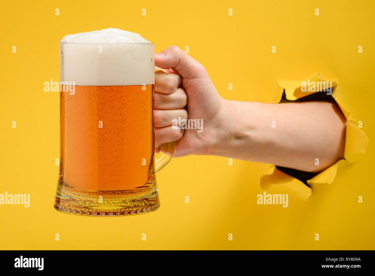 Hand taking a glass Stock Photo - Alamy