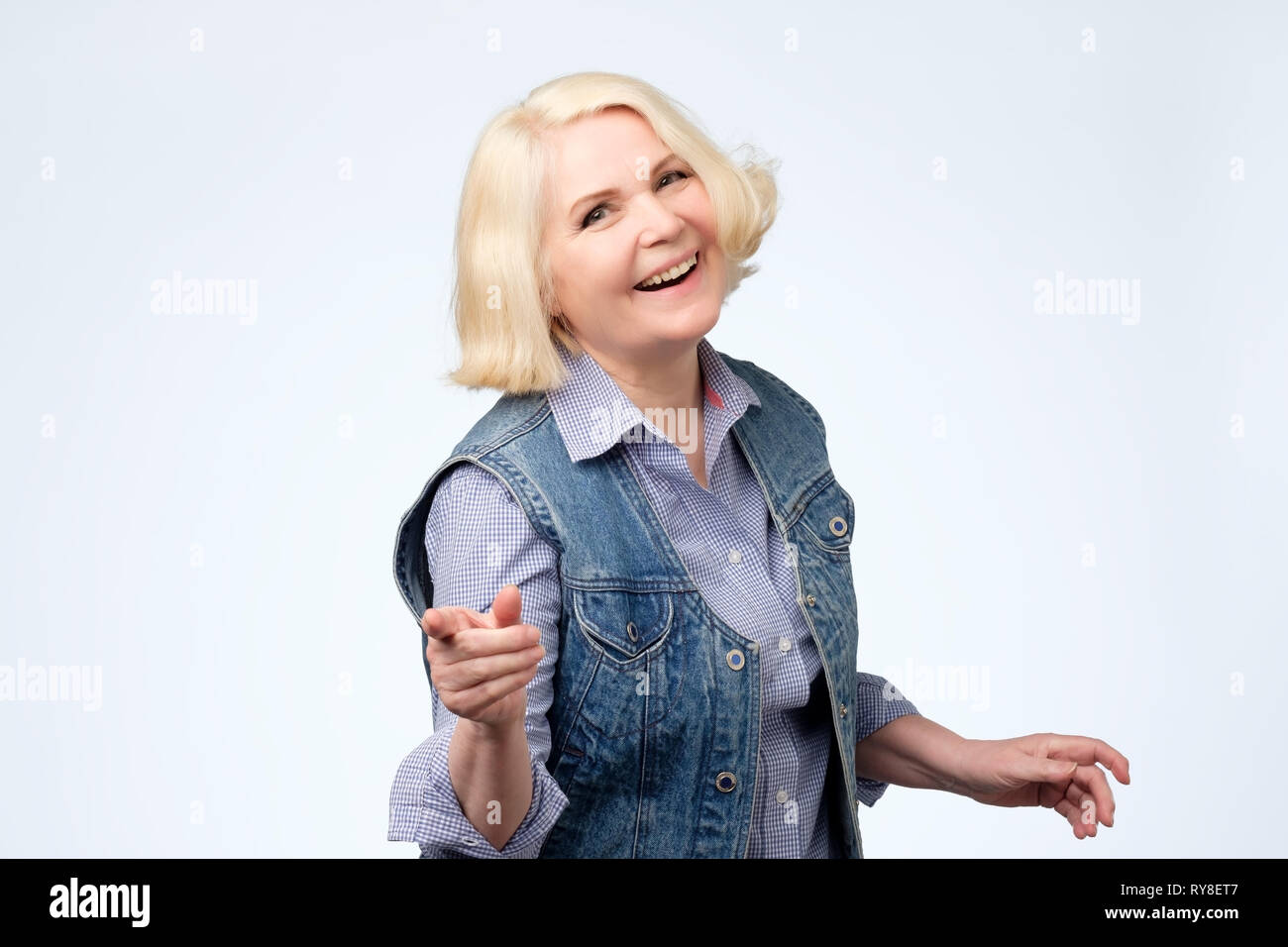 Woman pointing finger hi-res stock photography and images - Alamy