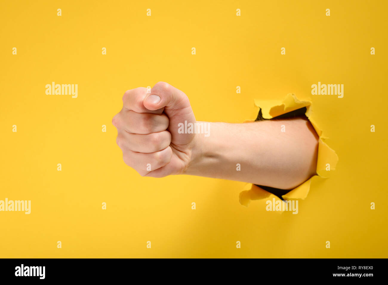Fist punching through wall hi-res stock photography and images - Alamy