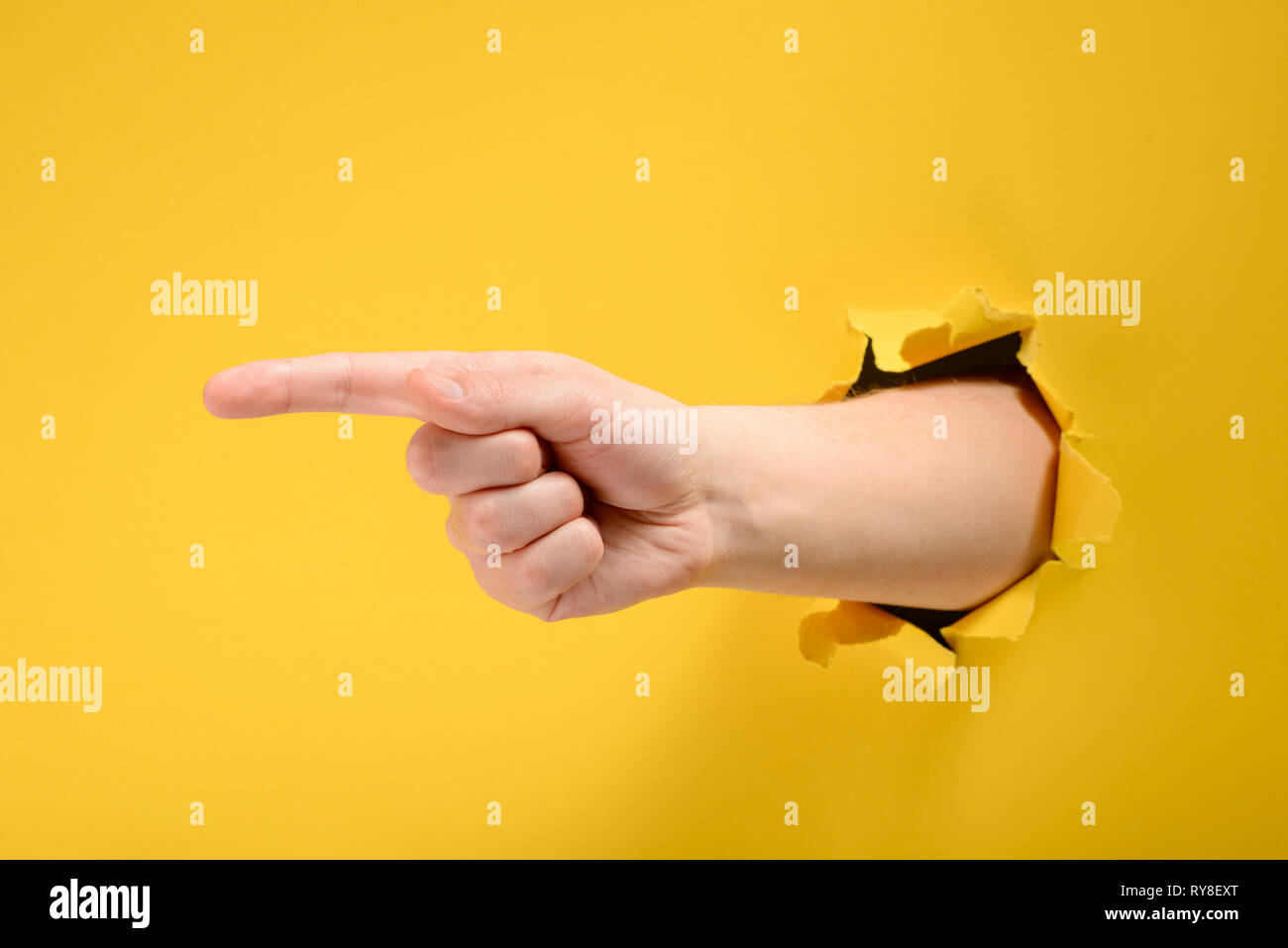 Hand point at something Stock Photo - Alamy
