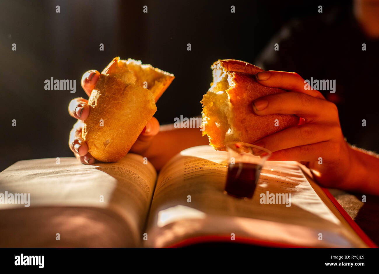 Communion cups and bread represent the last supper of Jesus, a symbolic ...