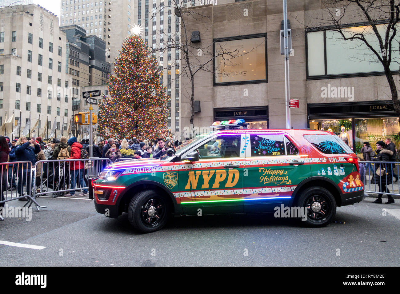Brightly Decorated Holiday NYPD cruiser at the Rockefeller Center ...