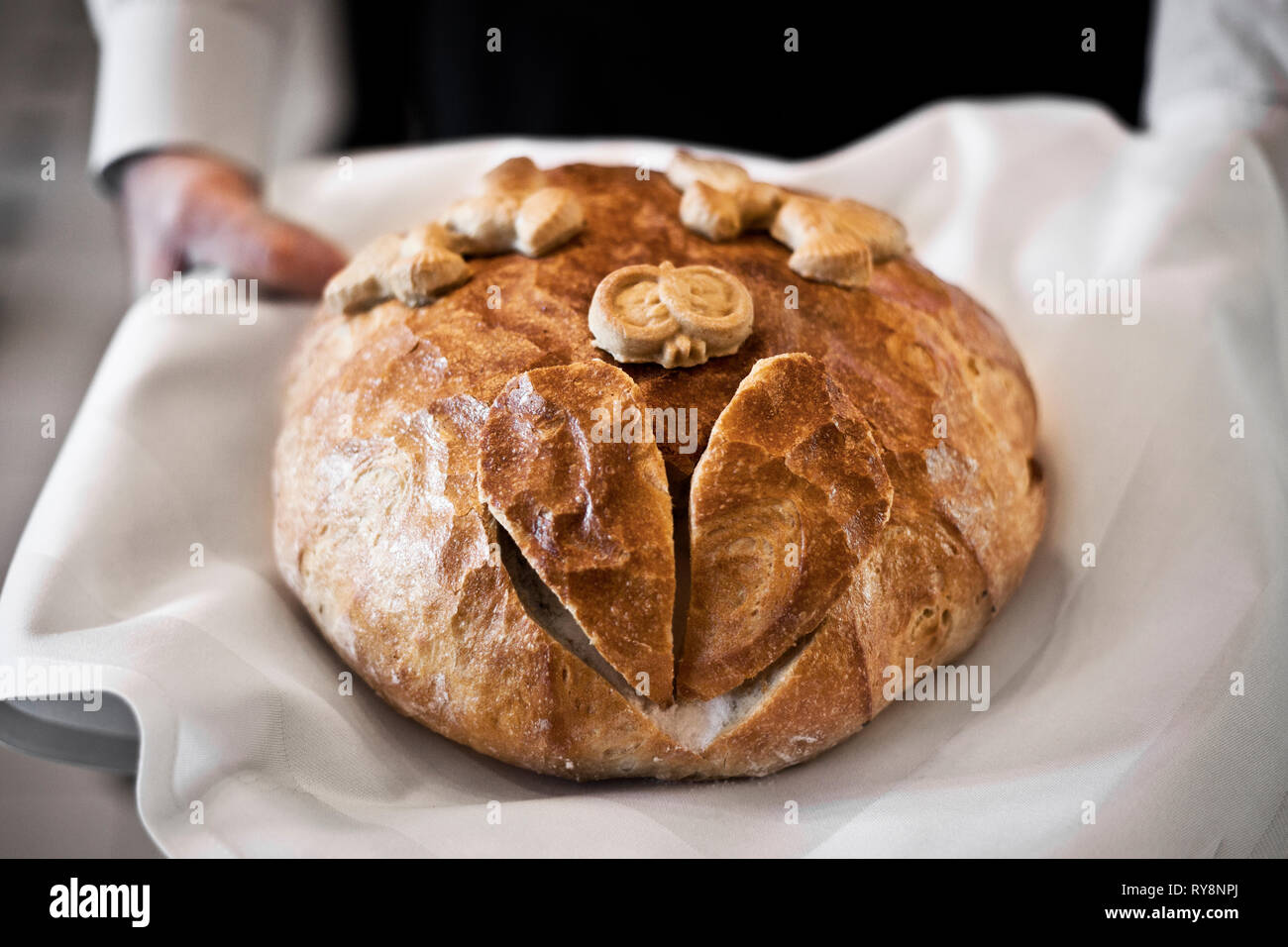 Wedding bread with salt detail on hands- traditional polish inviting to ...