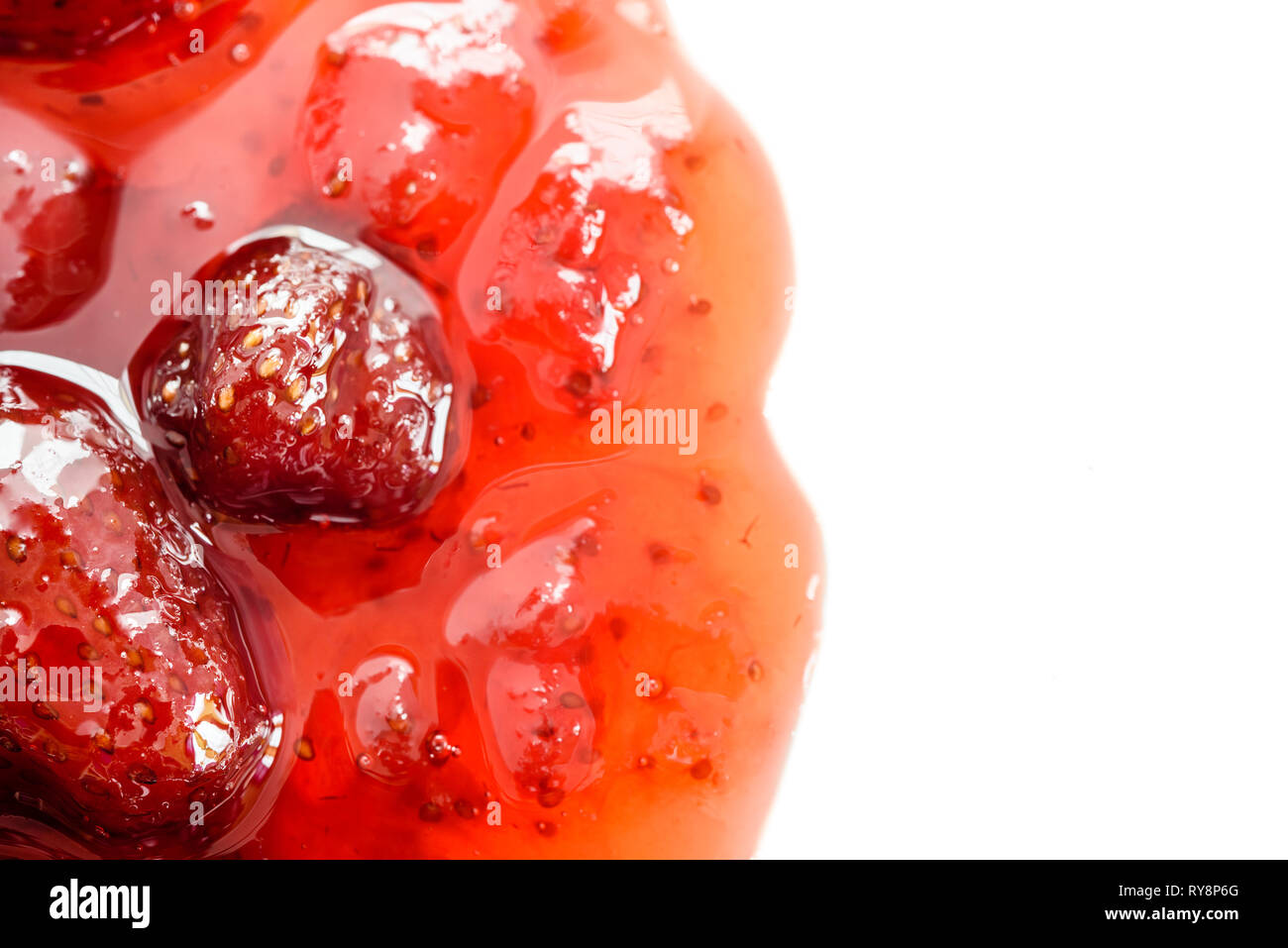 Strawberry jam on white background Stock Photo - Alamy