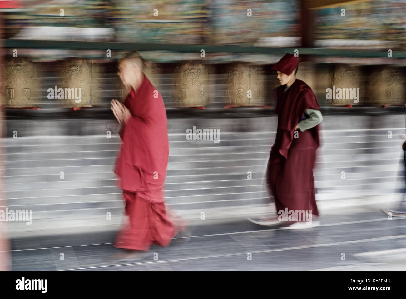Chinese monks walking around stupa, Wutai Shan, Shanxi, China Stock ...