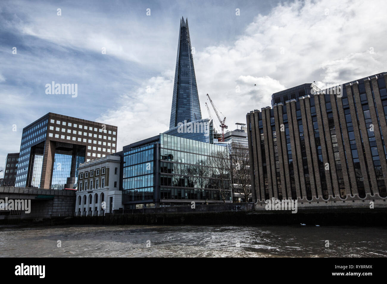 The Shard building, flanked by No.1 London Bridge building, 50.90m tall ...