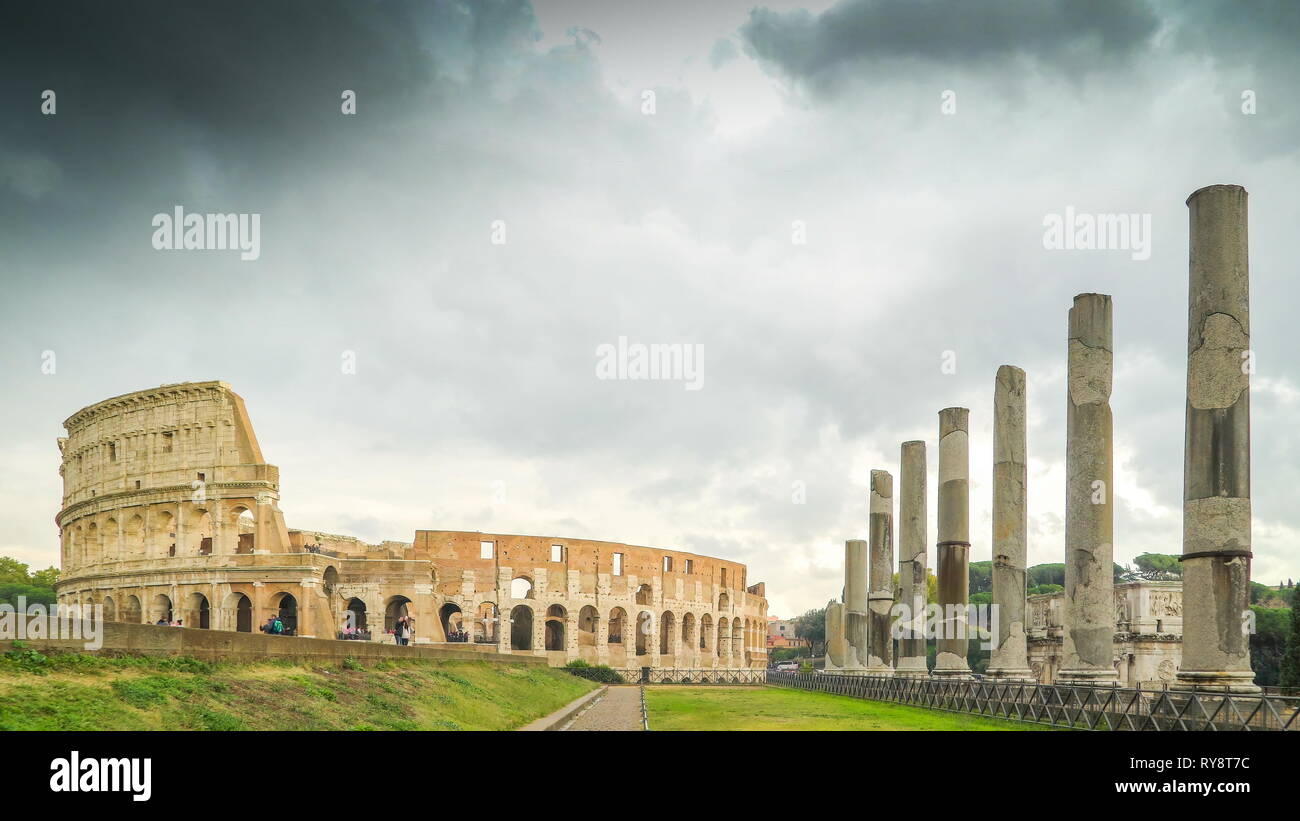 The tall towers on the side of the pathway on the lawn outside the huge ...