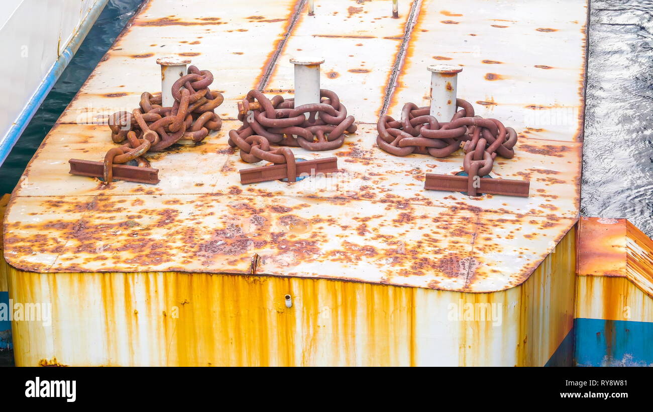 The rusty platform floating in the port of Messina in Sicily Italy with ...