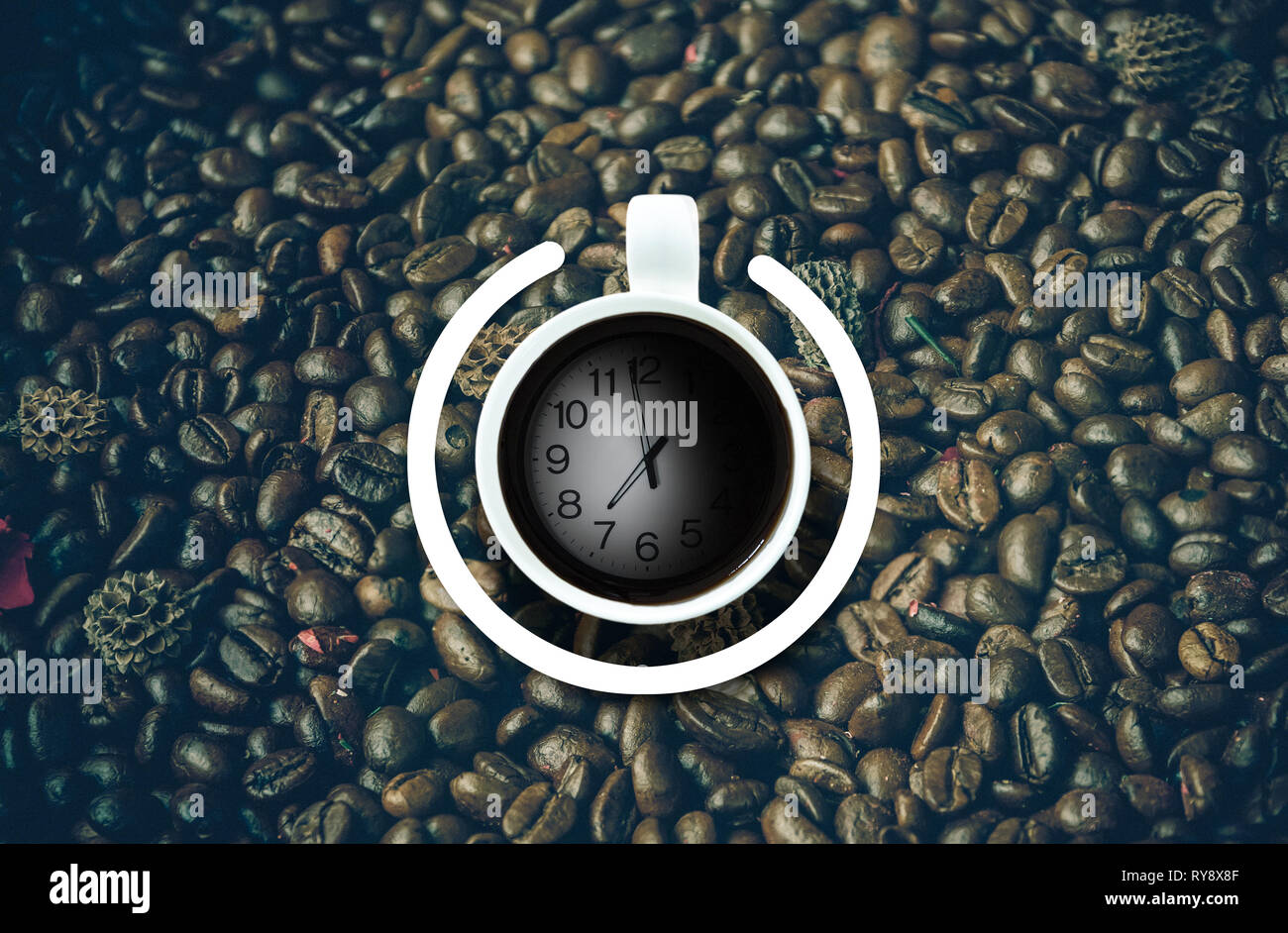 Coffee cup with power-on symbol and time over the coffee bean ...