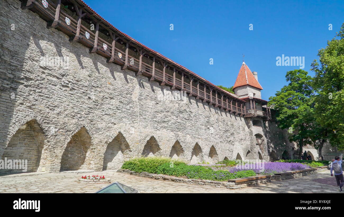 The side walkway of the old castle in Tallinn Estonia with a man ...