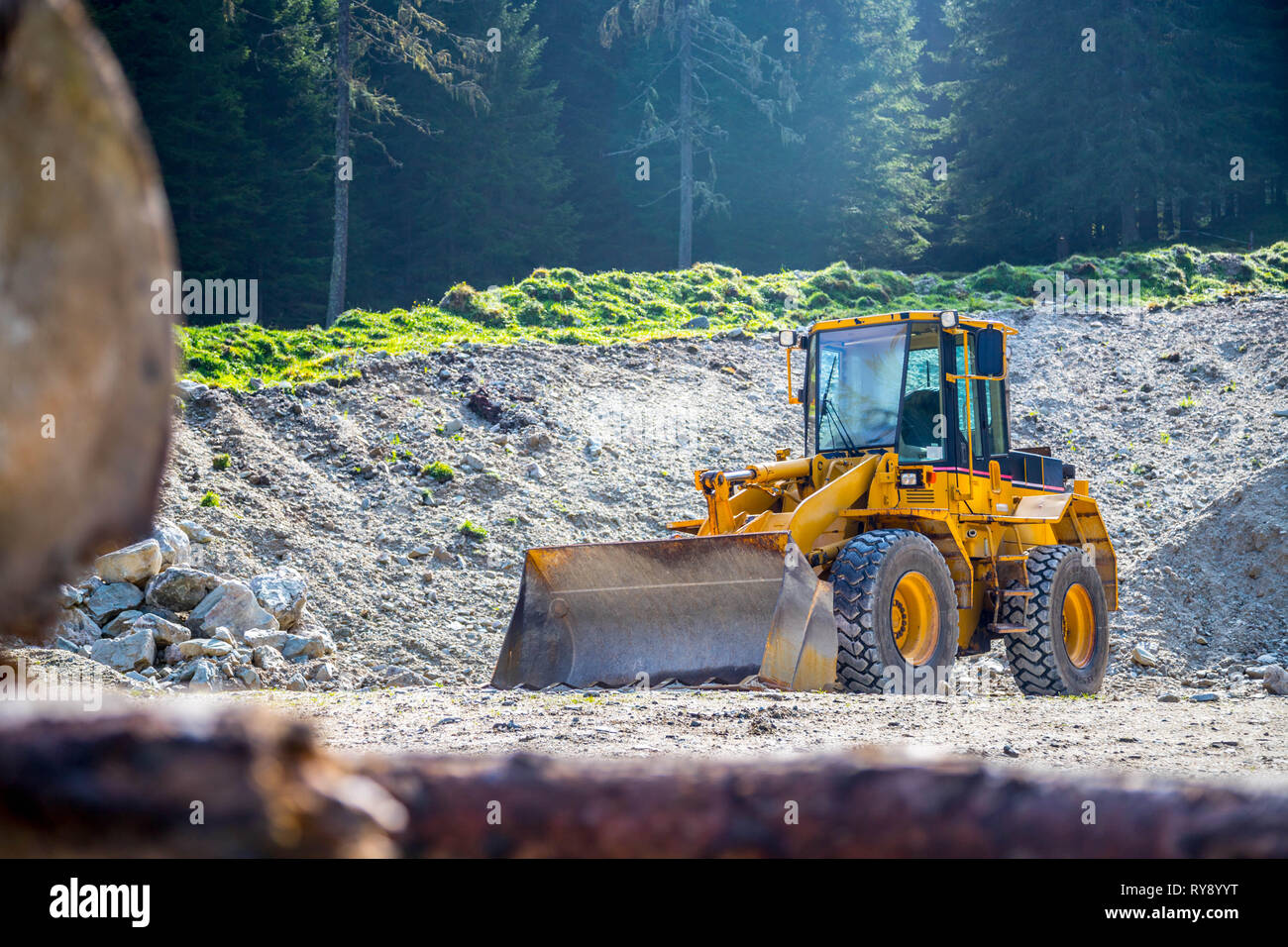 Wheel loader excavator is parking in a quarry Stock Photo - Alamy