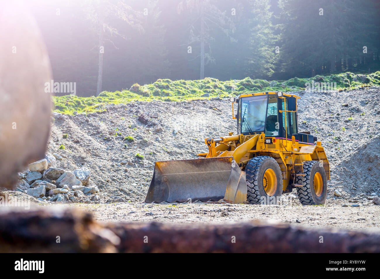 Wheel loader excavator is parking in a quarry Stock Photo - Alamy