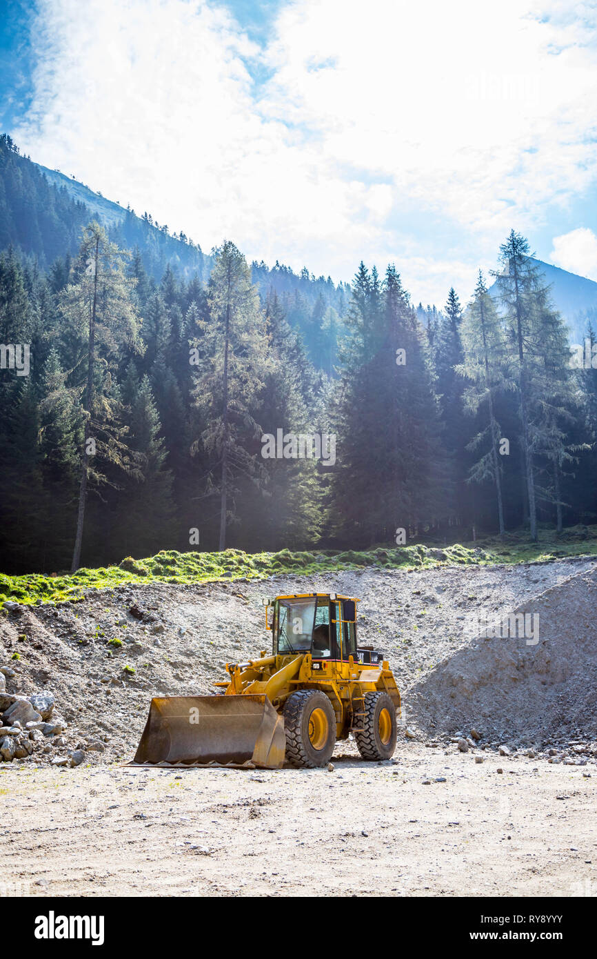 Wheel loader excavator is parking in a quarry Stock Photo - Alamy