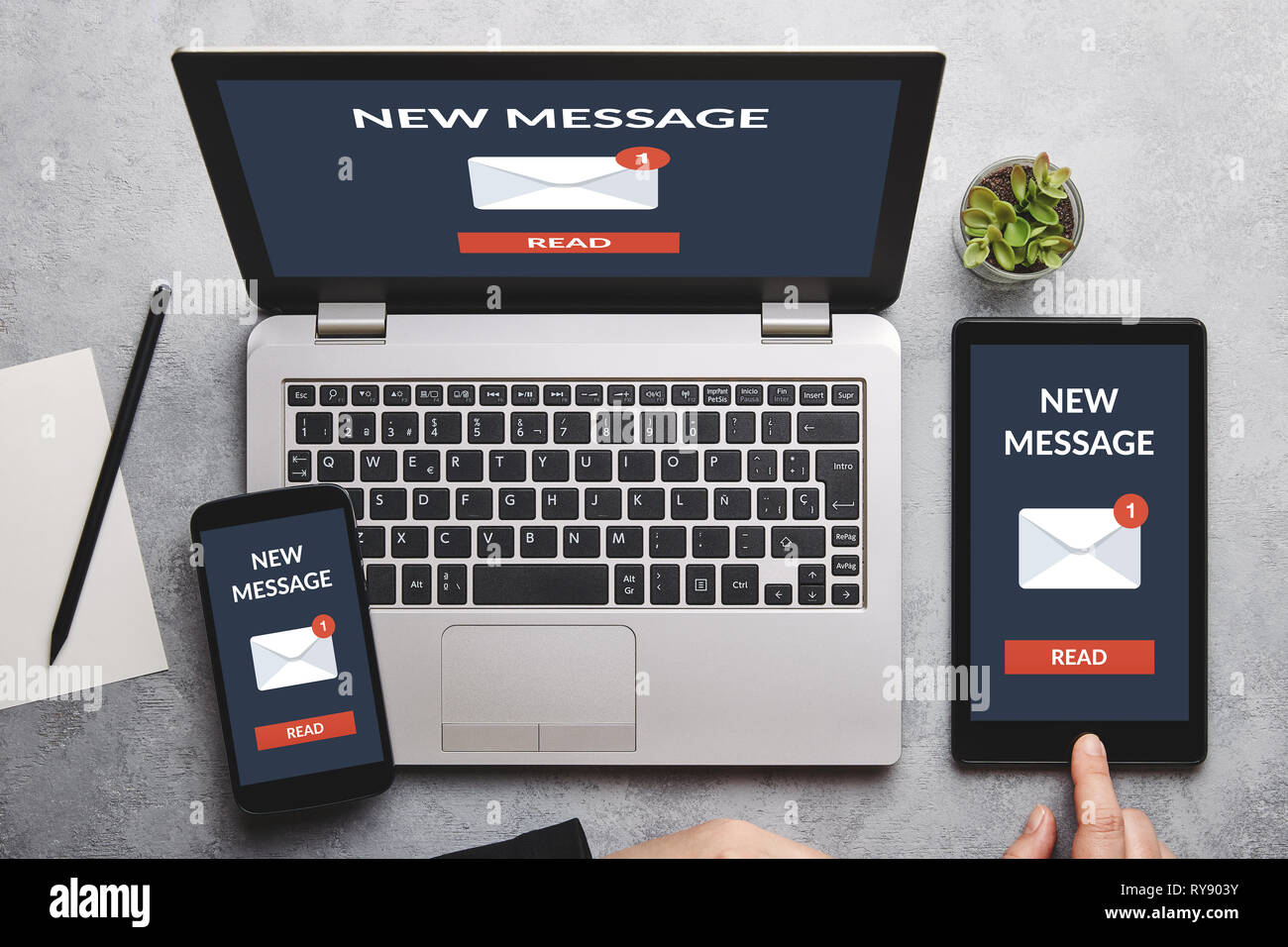 New message notification concept on laptop, tablet and smartphone ...