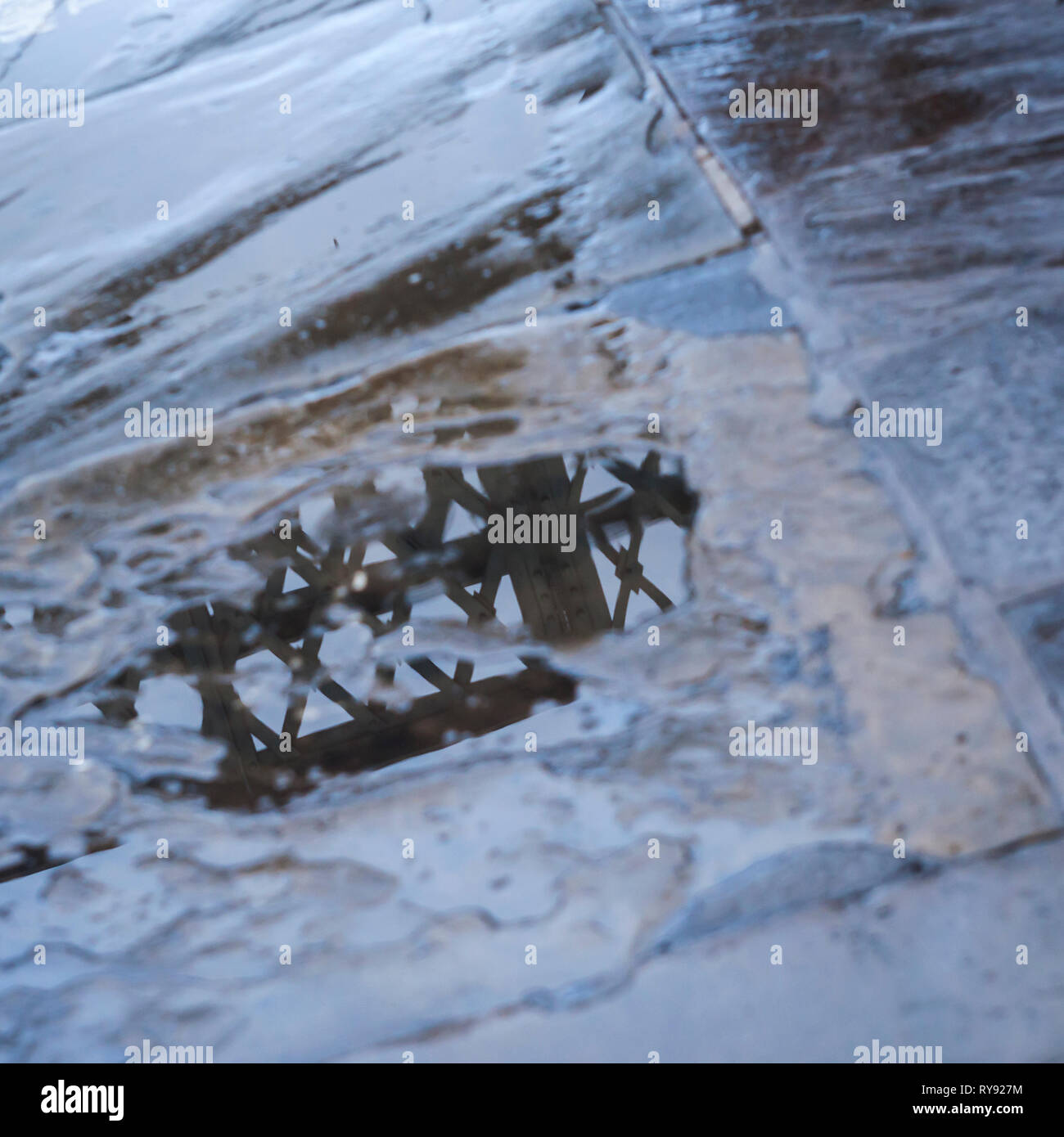 Reflection on stone path Stock Photo - Alamy