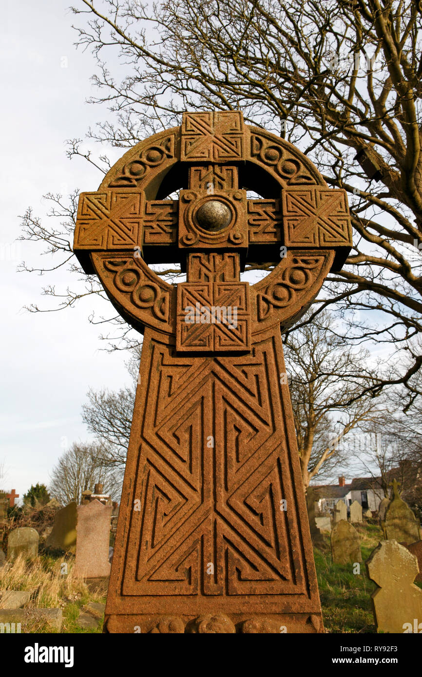 carved celtic cross in the graveyard of Saint Augustine's church ...