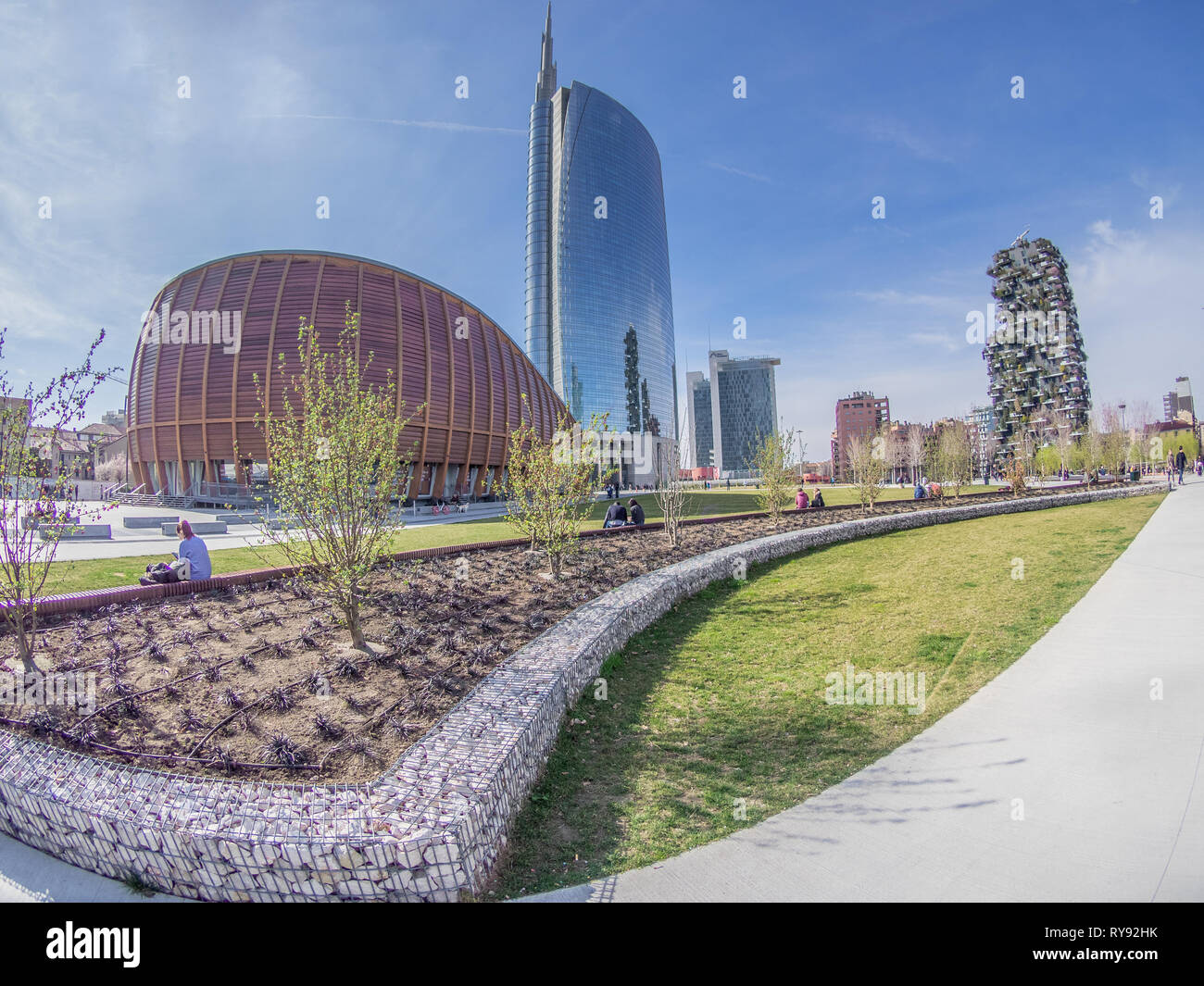 milan - italy, the gardens of Porta Nuova with futuristic buildings ...