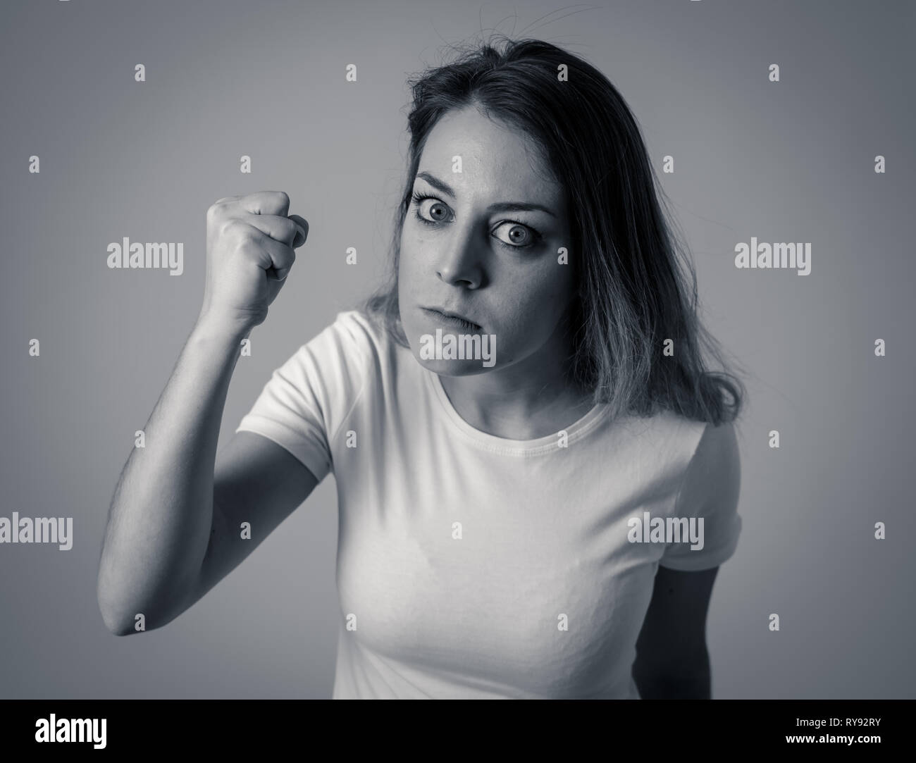 Close up portrait of young attractive caucasian woman with an angry ...