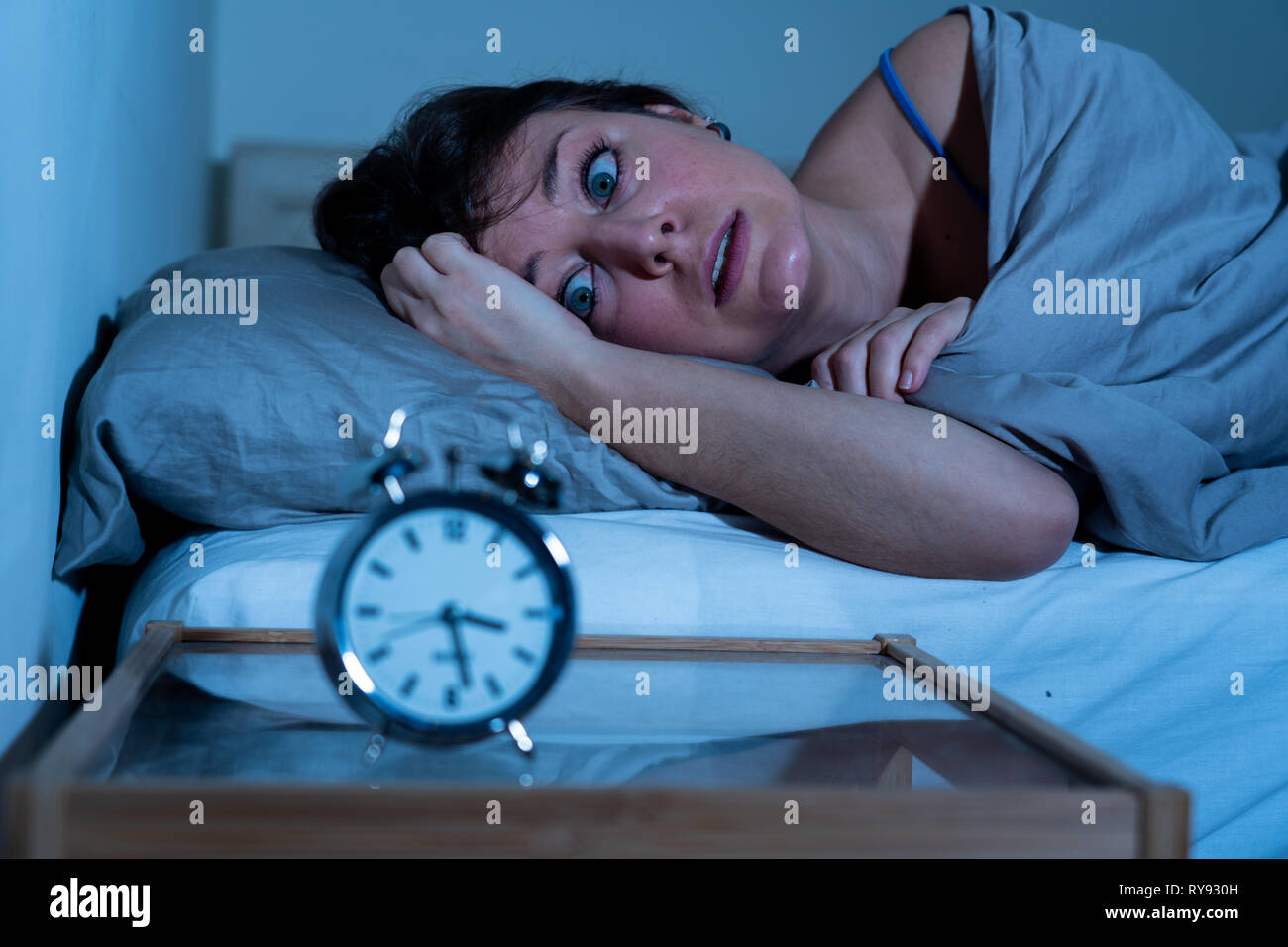 Woman and clock and night hi-res stock photography and images - Alamy