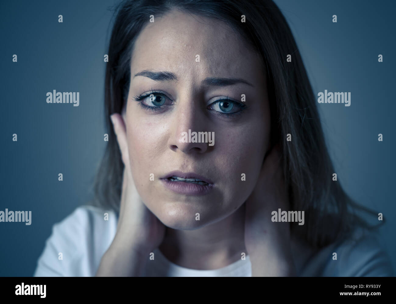 Close Up Portrait Of Beautiful Young Woman With Sad Mood Looking
