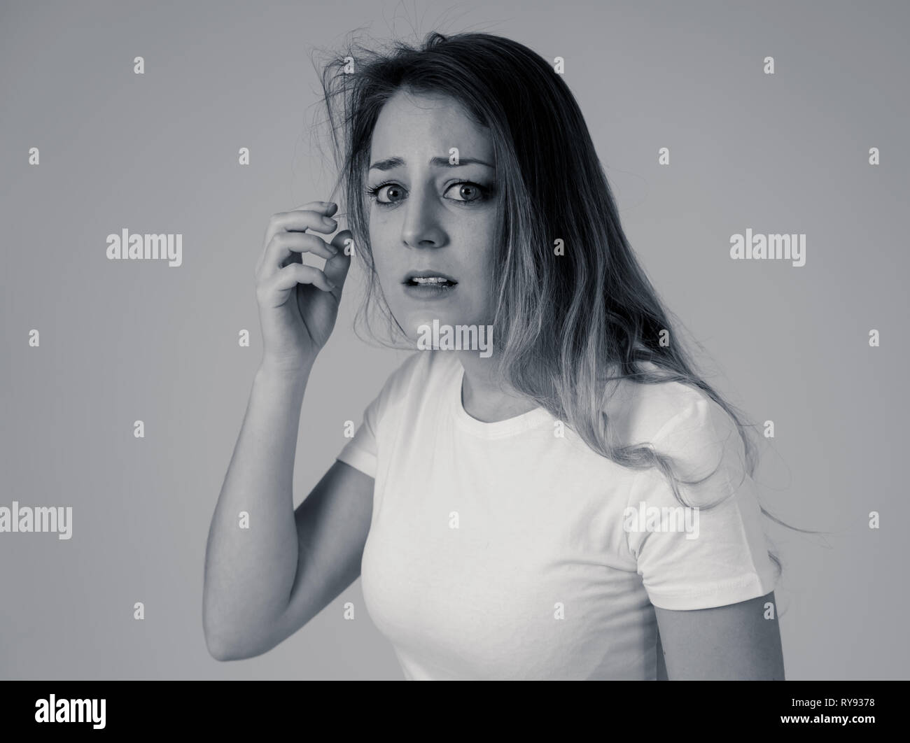 Close up of young woman feeling scared and shocked making fear, anxiety ...