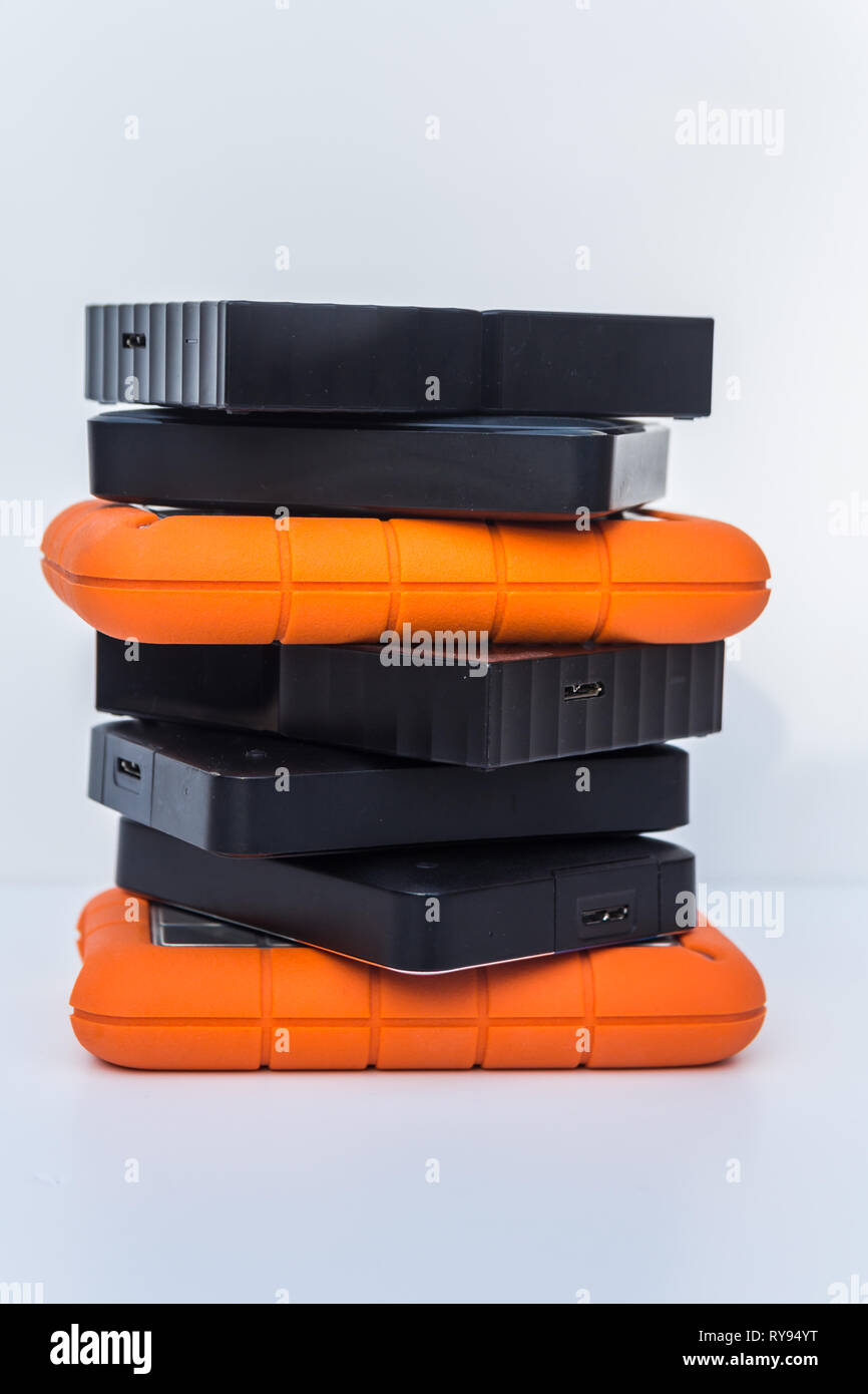 different kinds of external computer storage hard drives - isolated on ...