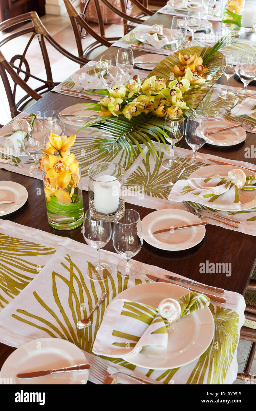 "Tropical table setting in Tamarind Cove, Antigua Stock Photo - Alamy
