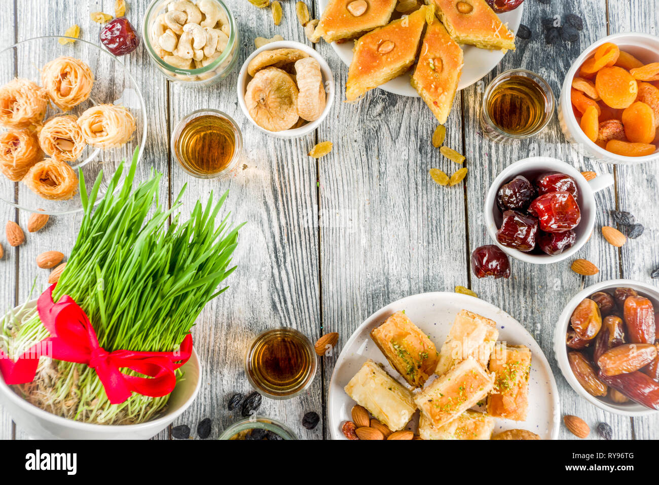 Happy Nowruz holiday background. Celebrating Nowruz sweets and treats ...