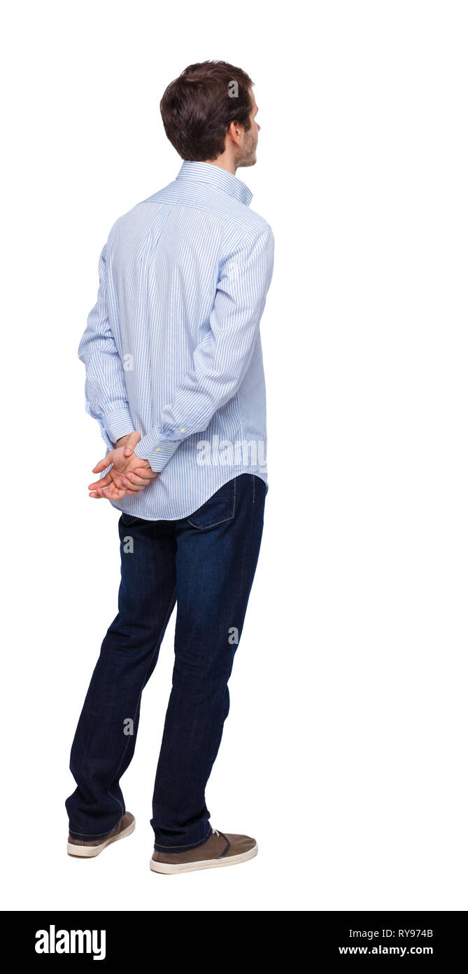 Back view of man in dark jeans. Standing young guy. Rear view people ...