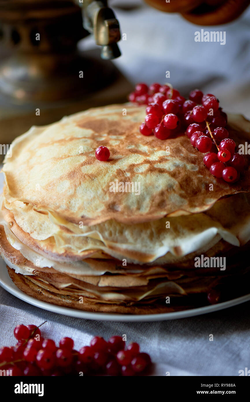 stack of pancakes with red juicy currants Stock Photo - Alamy
