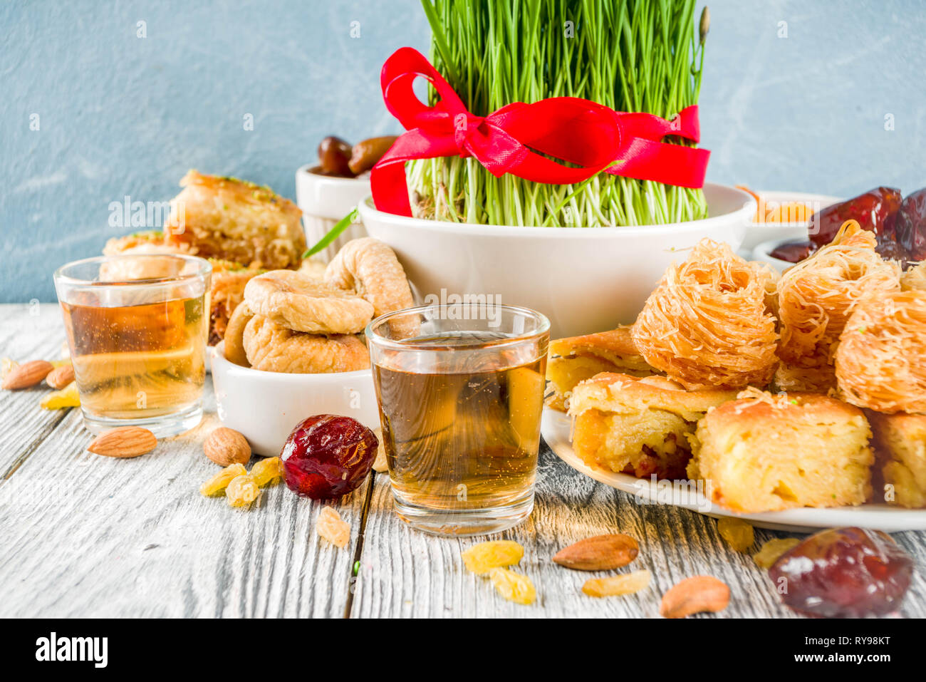 Happy Nowruz holiday background. Celebrating Nowruz sweets and treats ...